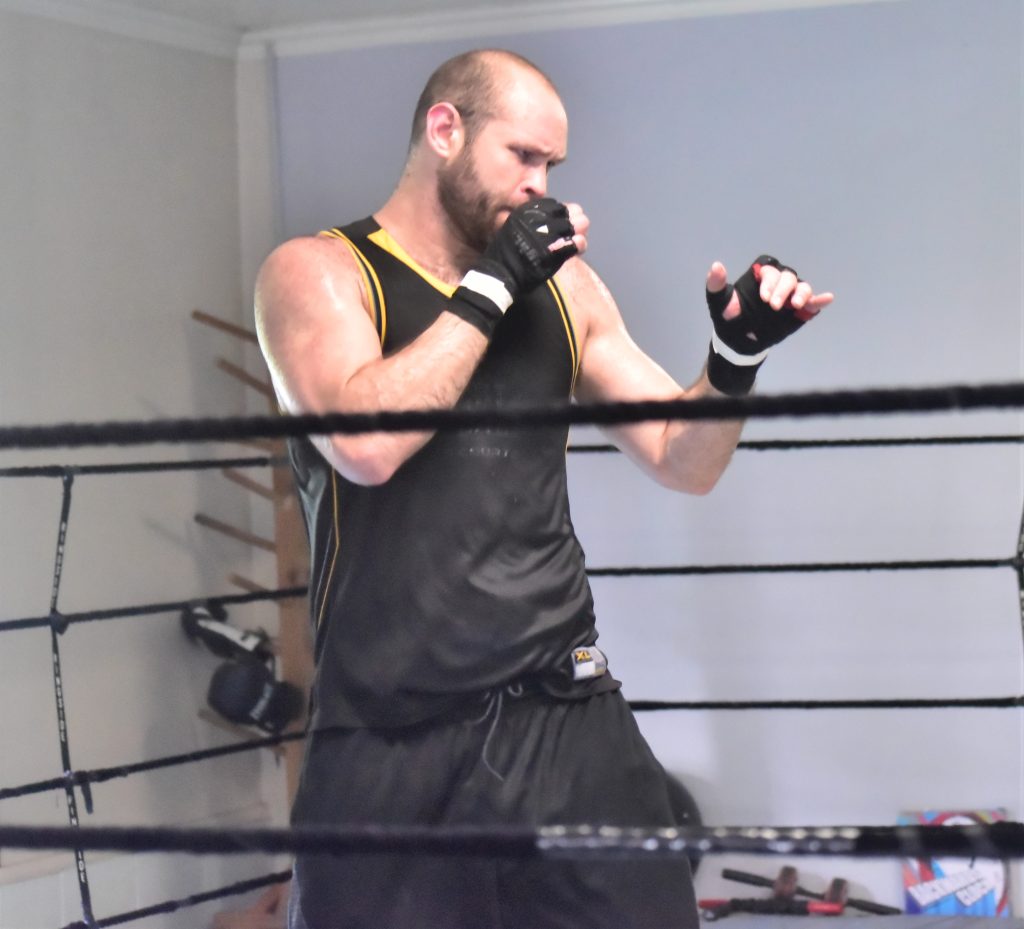 Garnic, Martz team up again for boxing match on national TV - Herald ...